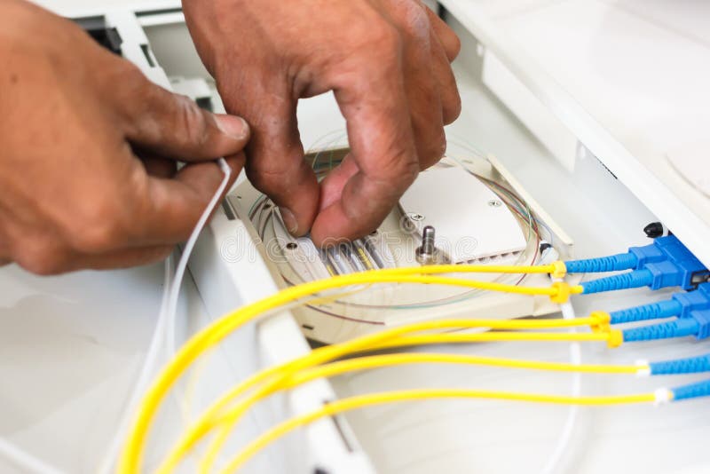 Fiber optic cable install stock image. Image of connector - 66684139