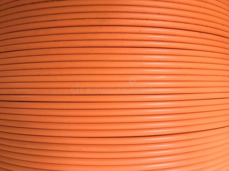 Fiber Optic Cables are Arranged in Rolls, Abstract Orange Background ...