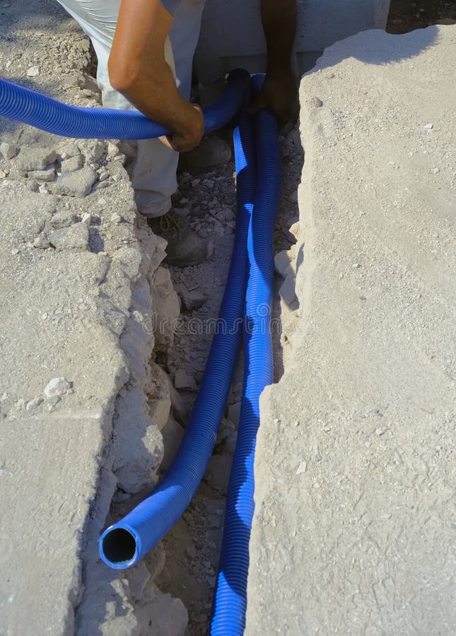 Fiber Optic Cables Buried in a Micro Trench Stock Image - Image of ...