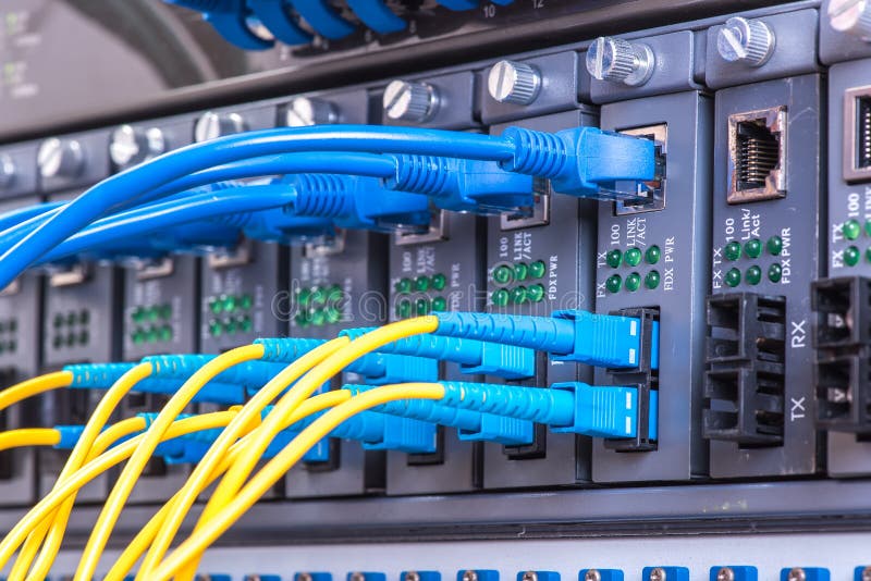 Fiber Optic Cables Connected To an Optic Ports and Network Cable Stock ...