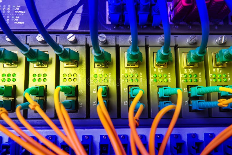 Fiber Optic Cables Connected To an Optic Ports and UTP Network Cables ...
