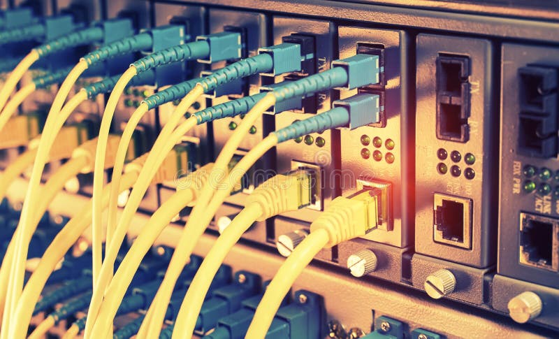 Fiber Optic Cables Connected To an Optic Ports and Network Cables ...