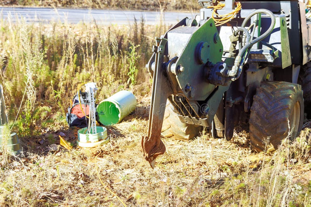 Fiber Optic Cables Laid with Help of a Trencher Cable Plow Tractor ...