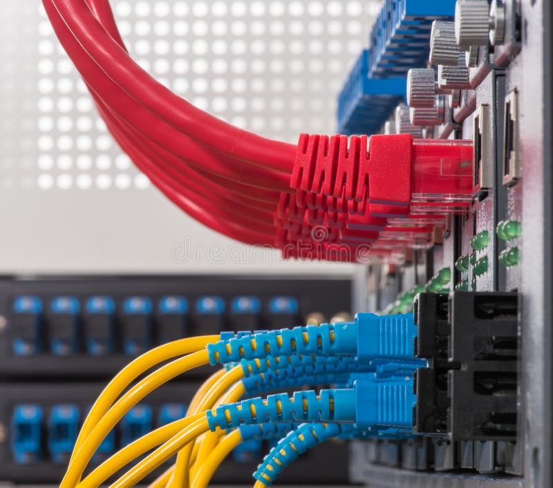 Fiber Optic Cables and UTP Network Cables Connected Hub Ports. Stock ...