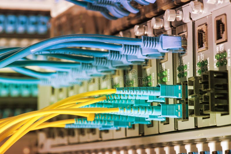Fiber Optic Cables and UTP Network Cables Connected Hub Ports. Stock ...
