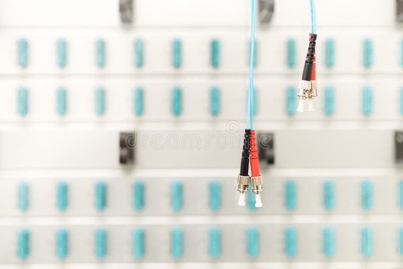Fiber Optic Connectors with Patch-panel on the Background, Server Room ...