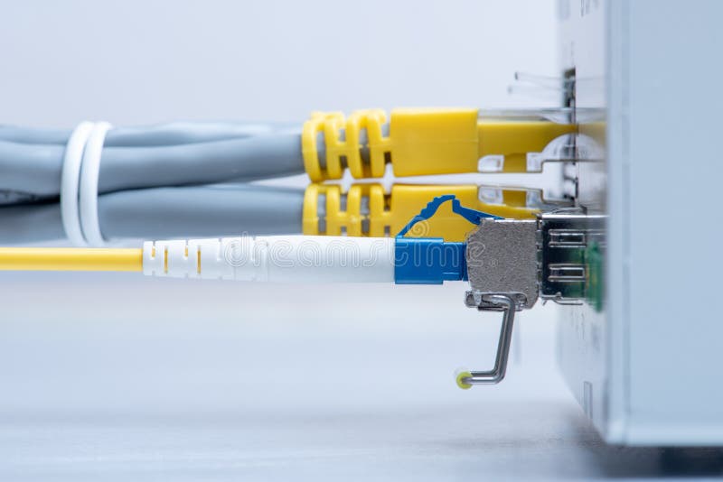 Fiber Optic and Network Patch Cord Cable Connect To the Switch Stock ...