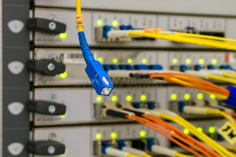Fiber Optic Patch-Cord is Shown Close-up in the Server Room of the Data ...