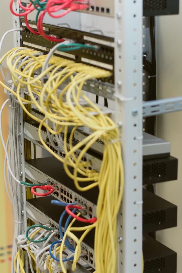 Fiber Optic in Server Room Close Up. Many Wires Connect To the Network ...