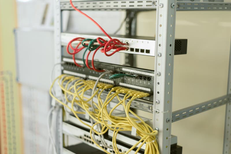 Fiber Optic in Server Room Close Up. Many Wires Connect To the Network ...