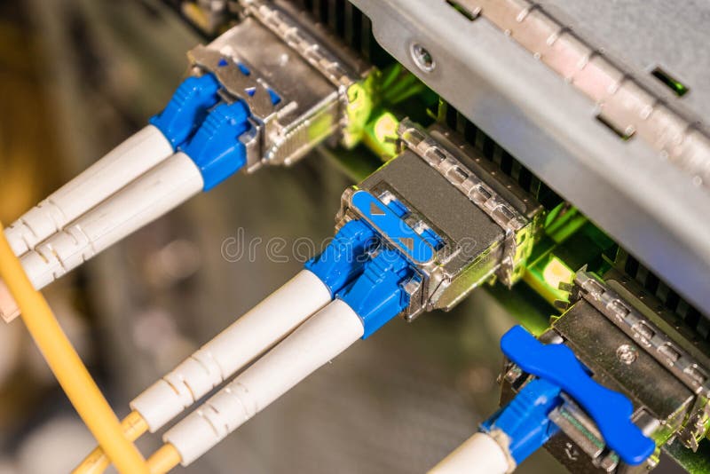 The Fiber Optic Wires are Connected To the Optical Interfaces of the ...