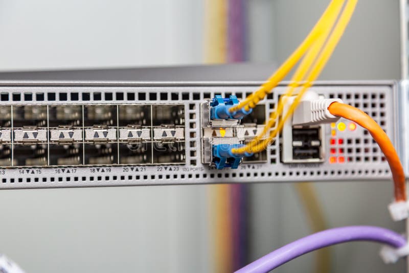 Fiber Optic Yellow-blue Cables are Plugged into the Data Jack ...