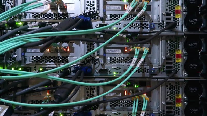 Severs Computer in a Rack at the Large Data Center. Many Optical Cable ...