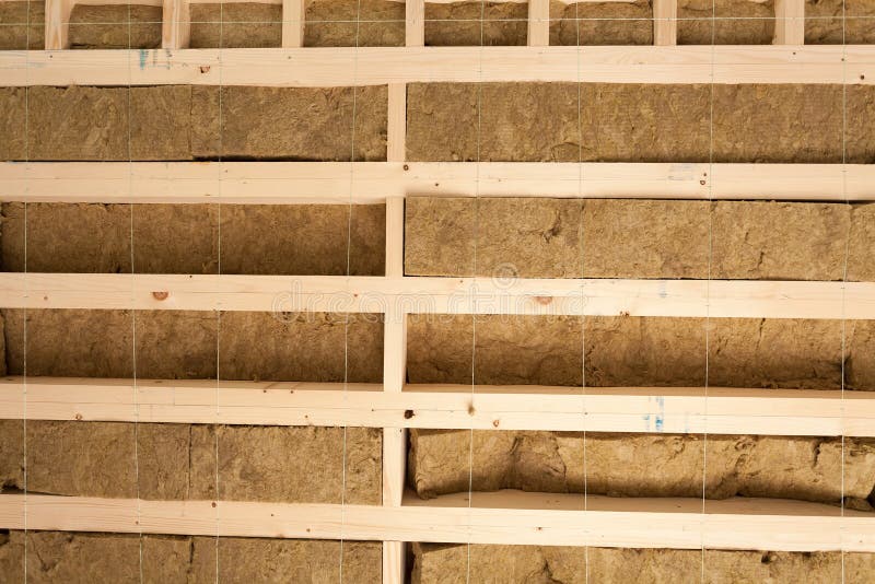 Fibreglass Insulation Installed in the Ceiling of a Timber House. Stock ...