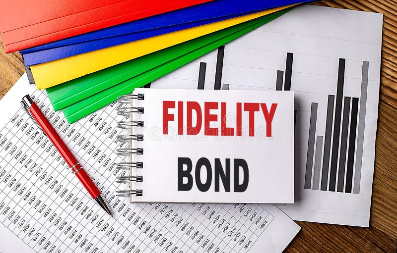 FIDELITY BOND Text on Notebook with Folder on Chart Stock Image - Image ...