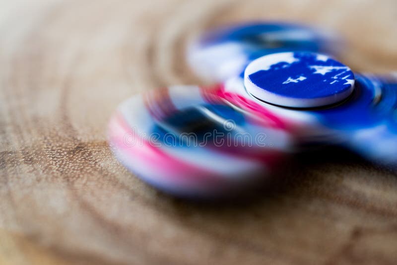 Fidget Spinner on a Grey Surface. Stock Photo - Image of catal, popular ...