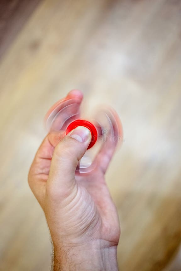 Fidget Spinner in the Man Hand Stock Image - Image of relaxing, anxiety ...