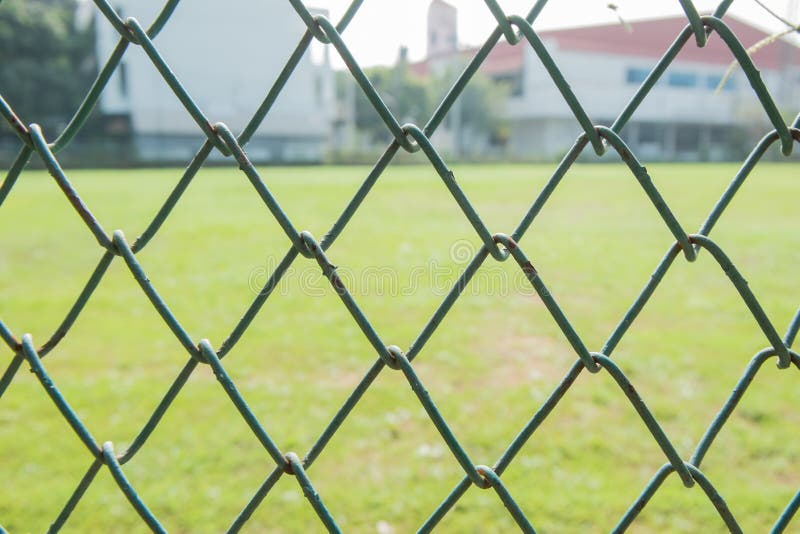 Field behind wire net stock photo. Image of border, wall - 61671966