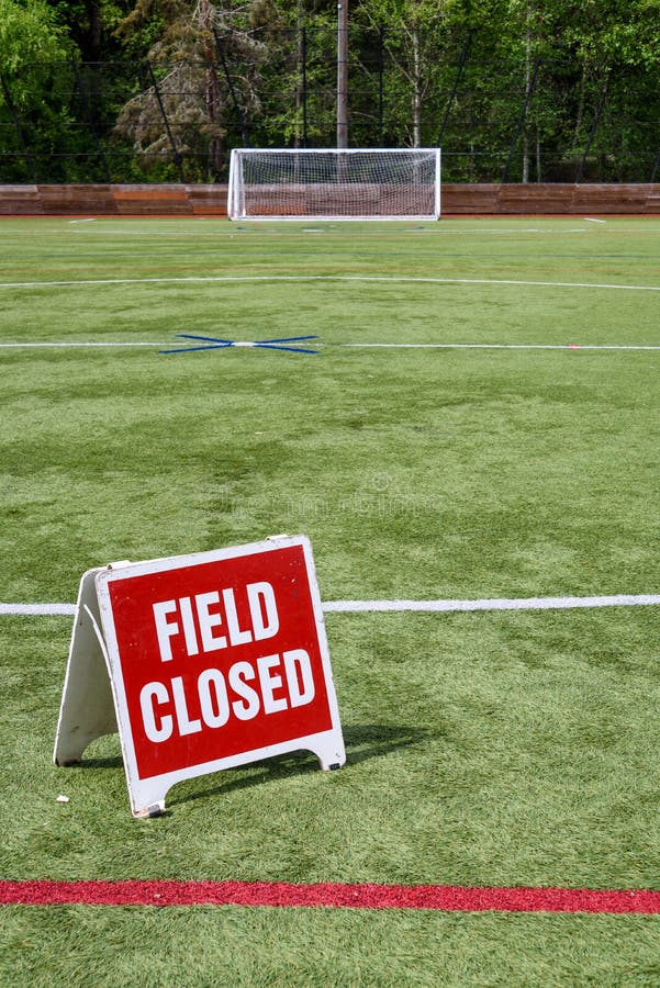 Field Closed Sign Behind Chain Link Fence, Athletic Field Closed Due To ...