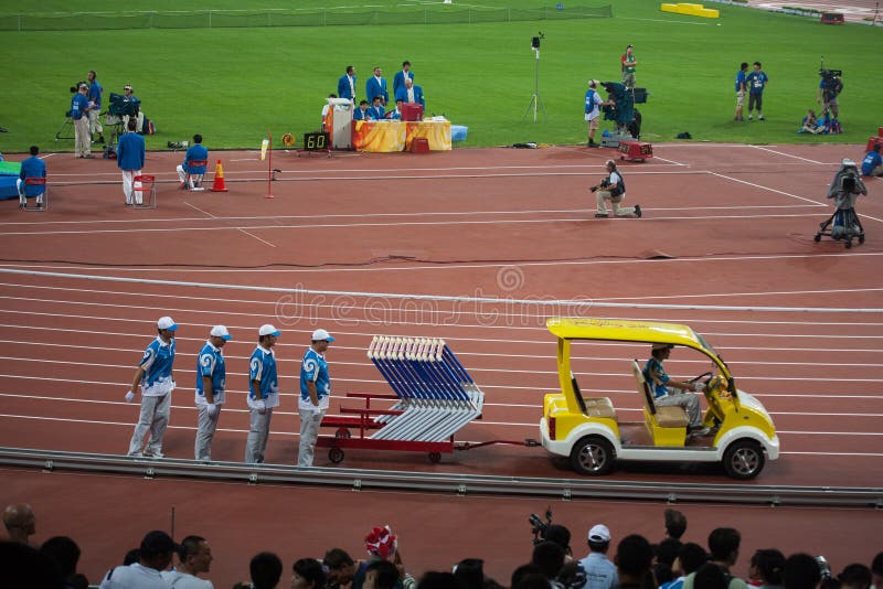 Field Crew Sets Up Hurdles for Track and Field Eve Editorial Stock ...