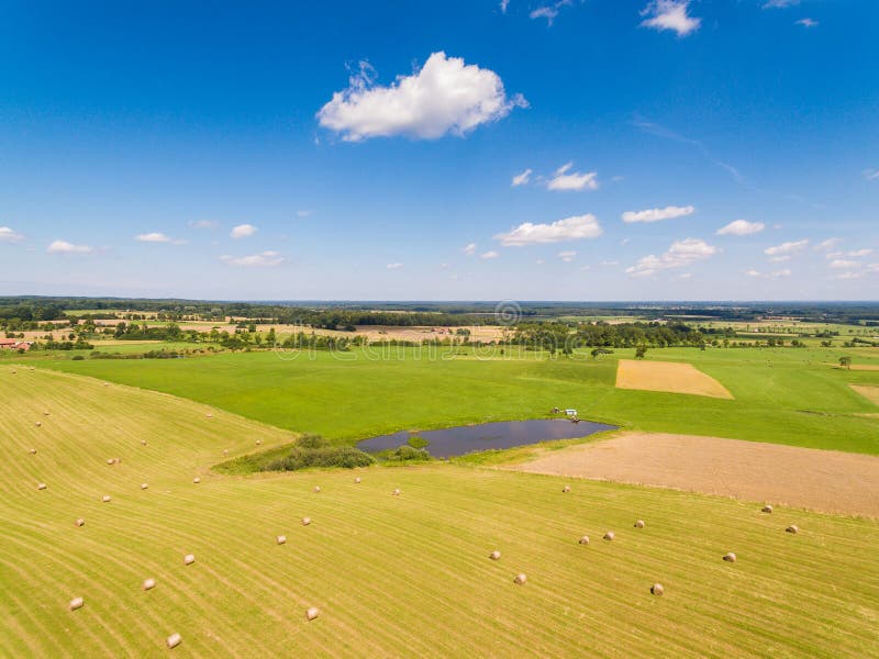 Field with haystacks stock image. Image of overhead, lake - 97173903
