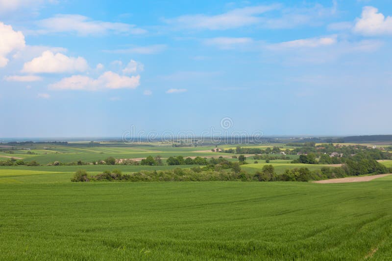 FIeld, hill and blue sky stock image. Image of ecology - 154813403