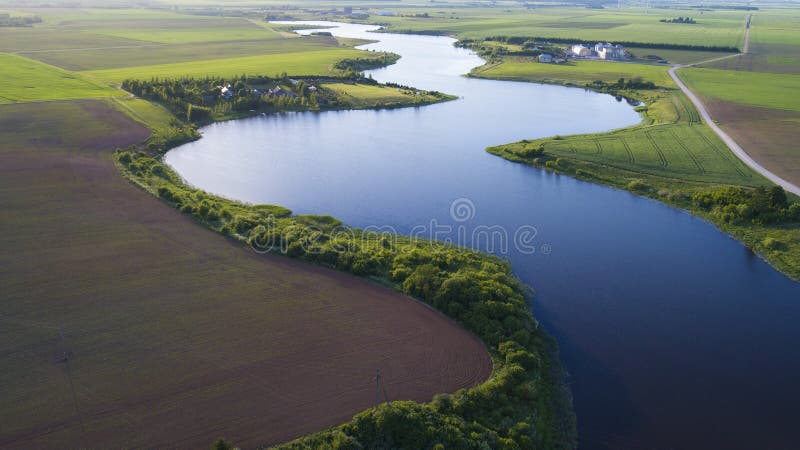 Field and river stock photo. Image of view, plant, terrain - 100781608