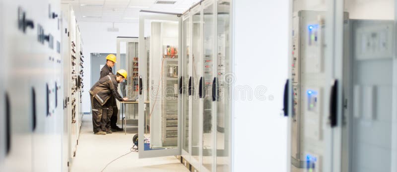 Field Service Crew Testing Electronics or Inspecting Electrical Stock ...