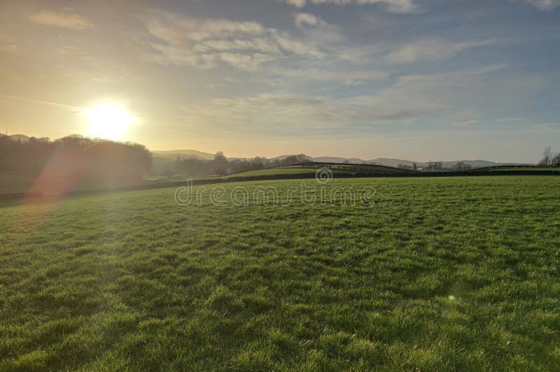 Field setting sun stock image. Image of horizon, setting - 214834035