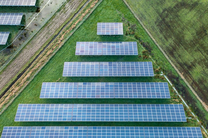 Field with Several Rows of Solar Panels, in the Style of Symmetrical ...