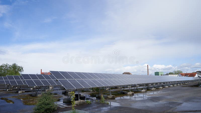 A Field with Solar Panels for Power Generation. Solar Panels after the ...