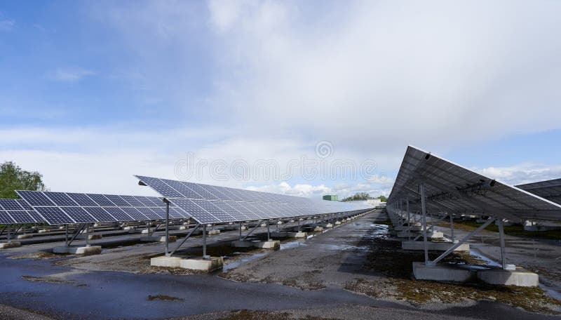 A Field with Solar Panels for Power Generation. Solar Panels after the ...