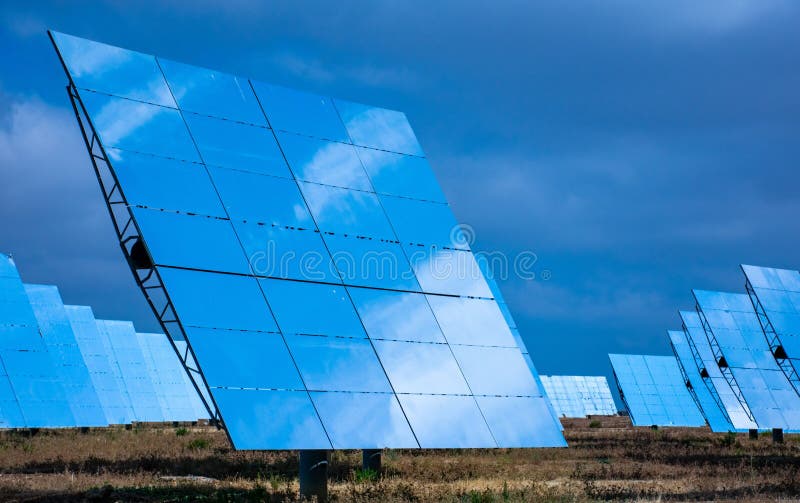 Field of Solar Panels on a Sunny Day Stock Photo - Image of electric ...