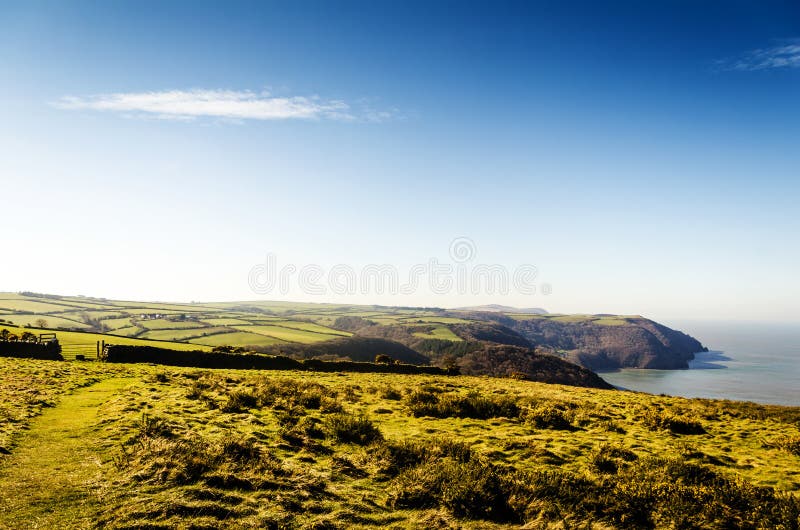 Fields on Top of Cliffs with Blue Sky in England Stock Photo - Image of ...