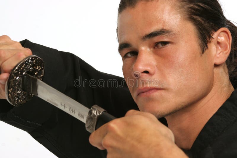 Fierce Look Over a Sharp Blade Stock Photo - Image of samurai, mouth ...