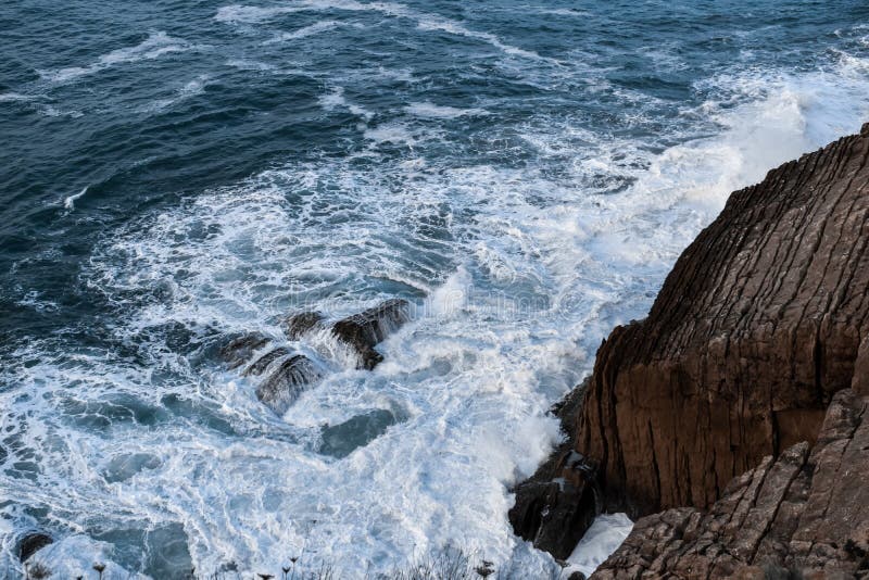 Waves Breaking Against the Rocks Stock Photo - Image of waves, nature ...