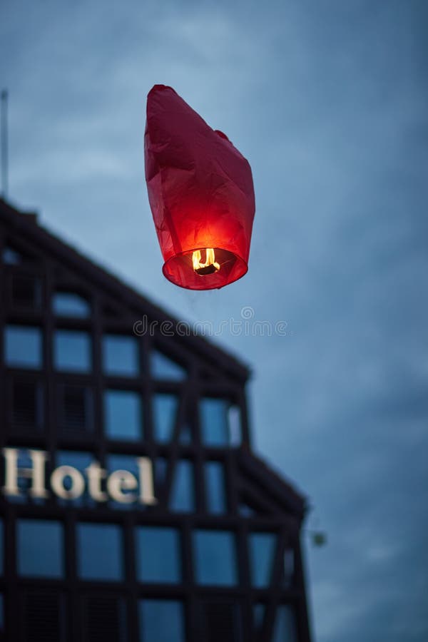 Fiery Balloon Launched into the Sky Above the City Stock Photo - Image ...