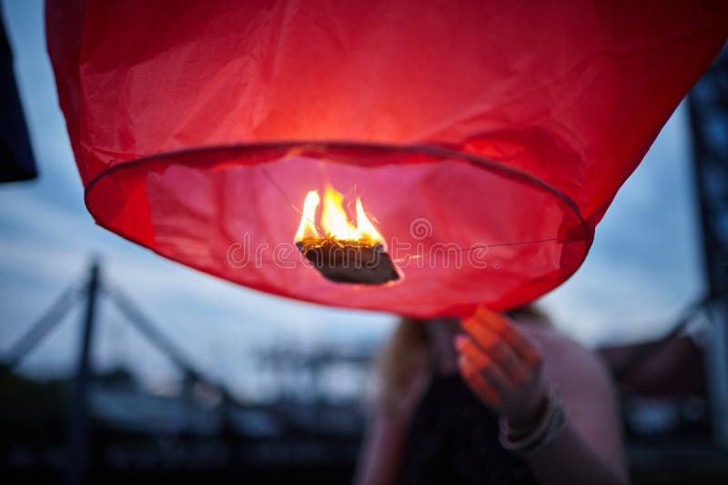 Fiery Balloon Launched into the Sky Above the City Stock Image - Image ...