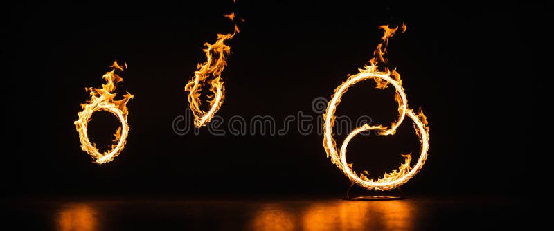 Fiery Circular Hoops on Dark Background Symbolizing Passion and Energy ...