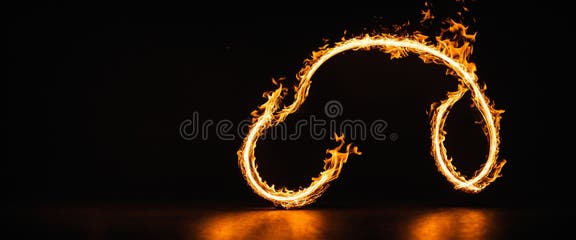 Fiery Circular Hoops on Dark Background Symbolizing Passion and Energy ...