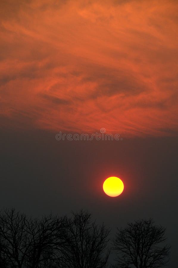A Burning African Sunset In The Hanging Dust Stock Image - Image of ...