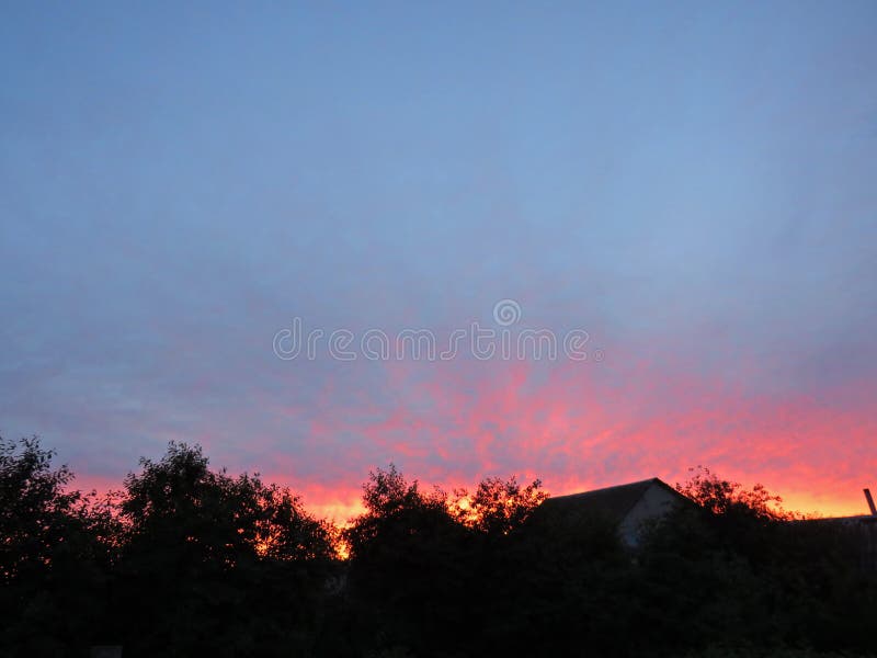 Fiery Colors of the Sunset in the Evening Sky Stock Image - Image of ...