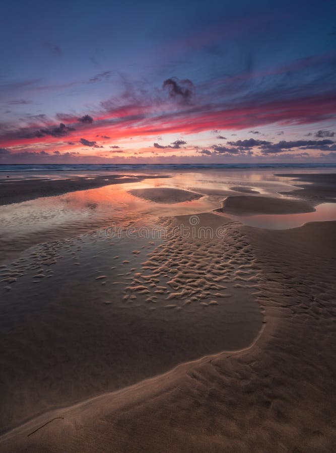 Fiery Evening Sky, Perran Sands, Cornwall Stock Image - Image of ...
