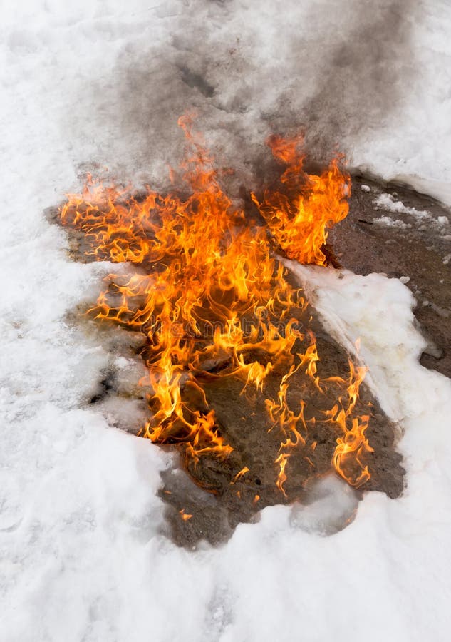 Fiery Flame on the White Snow in Winter Stock Photo - Image of science ...