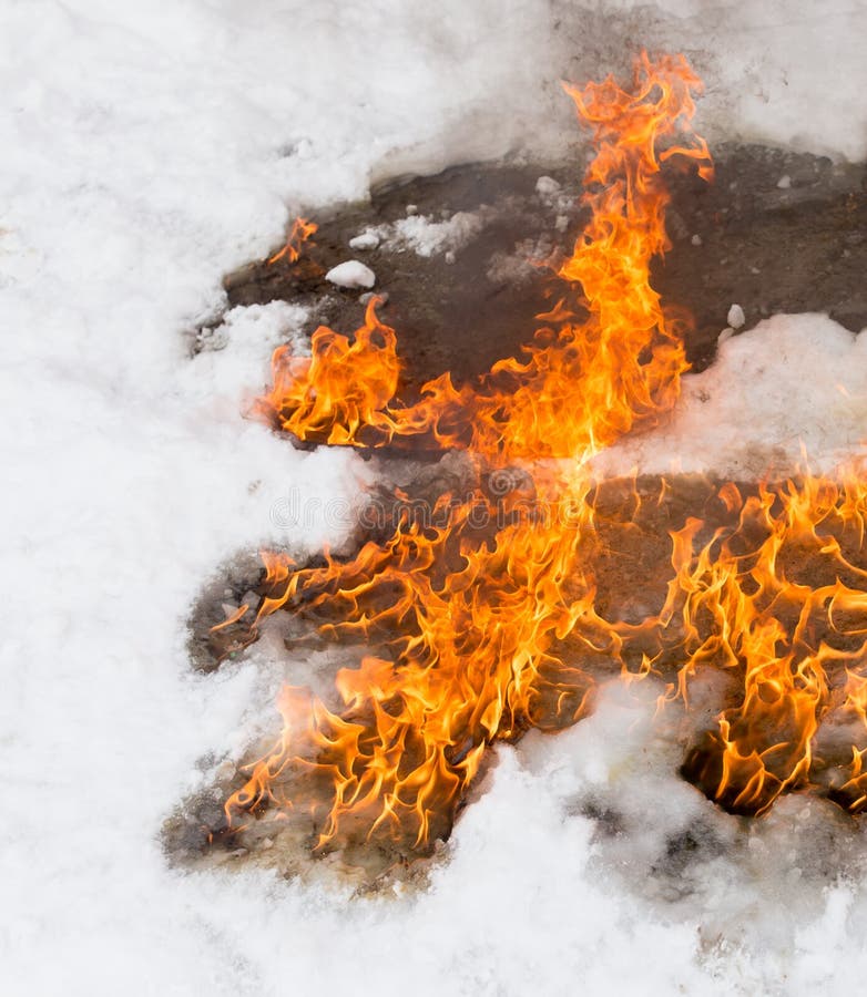 Fiery Flame on the White Snow in Winter Stock Photo - Image of water ...