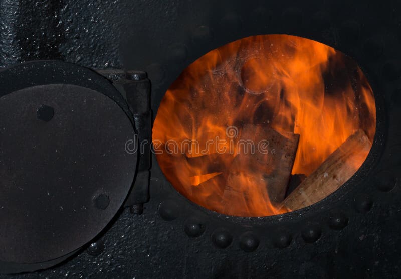Fiery Furnace With Coal And Hot Metal Parts For Further Processing, Old ...