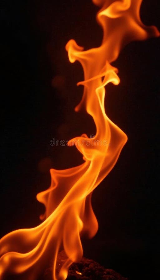 Fiery Orange and Yellow Flames Dance Against a Stark Black Backdrop ...