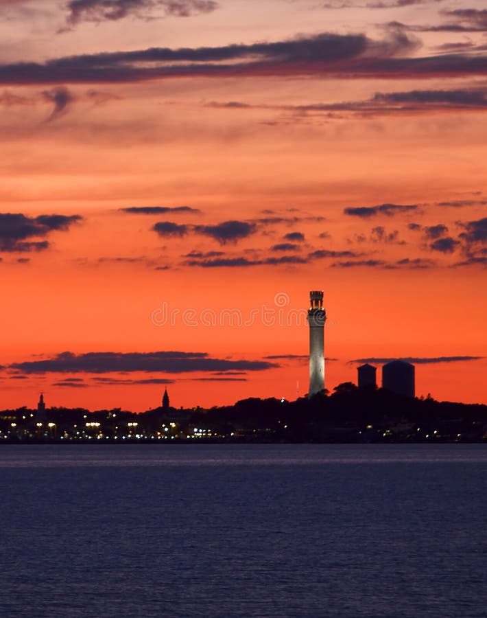 A Fiery Red Sunset Frames a Cape Cod Scene Stock Photo - Image of ...