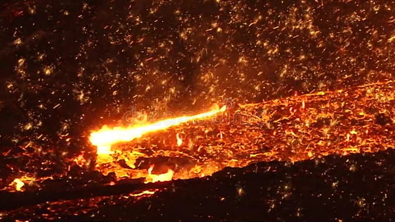 Fiery Molten Metal Pours into a Dark Cast. the Glow of the Lava Creates ...