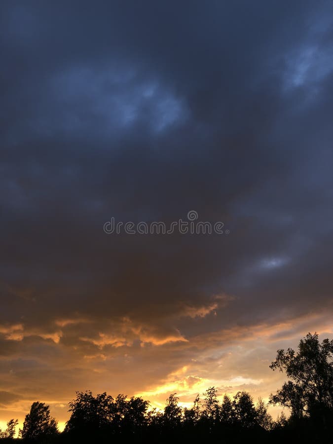 Magic clouds stock image. Image of evening, tree, cloud - 219548365